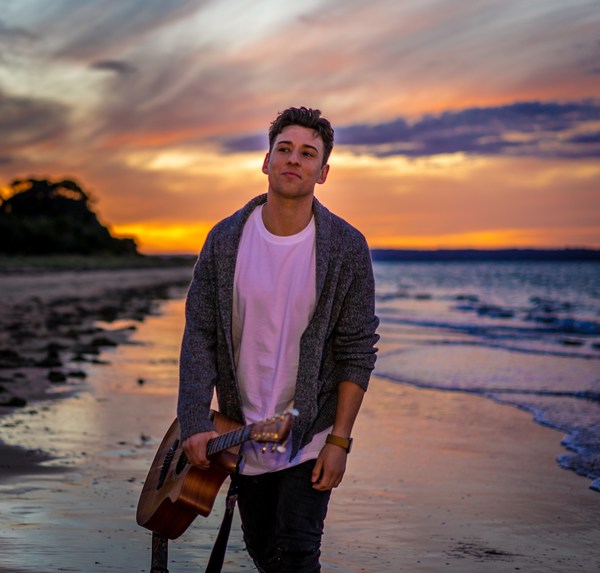 Taylor Henderson brings holiday cheer with two new songs performed on ...
